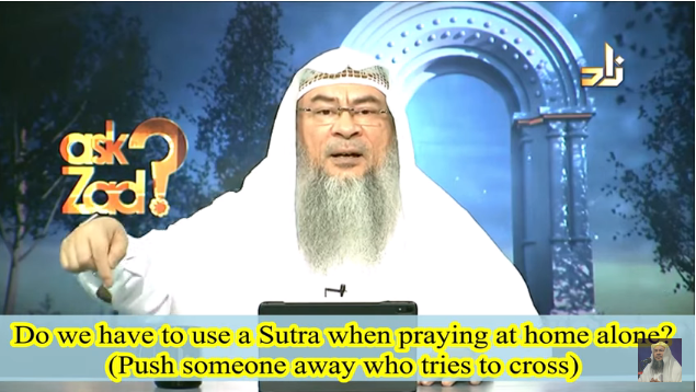 Is it compulsory to have a Sutra in front of you while praying alone?